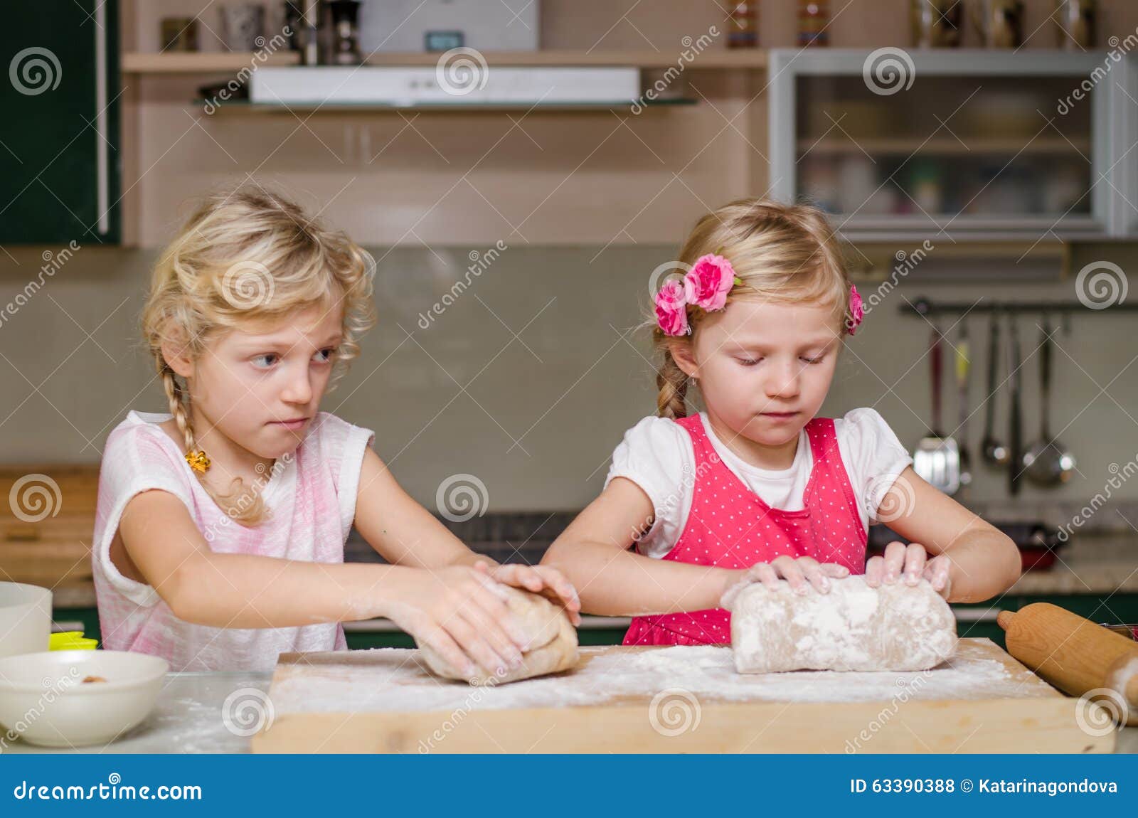 Kids working in kitchen stock photo. Image of rolling - 63390388
