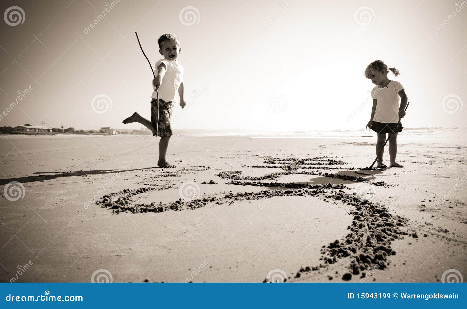 Kids writing in sand stock image. Image of blonde, brother - 15943199