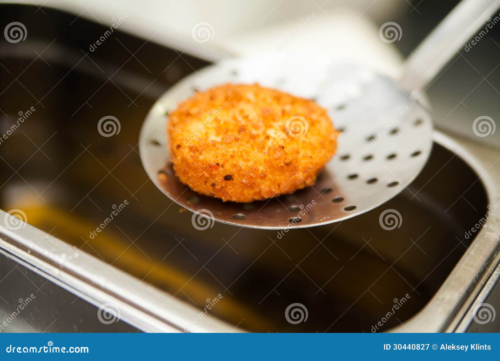 Kiev Chicken on Perforated Spoon Stock Image - Image of chicken, tasty ...