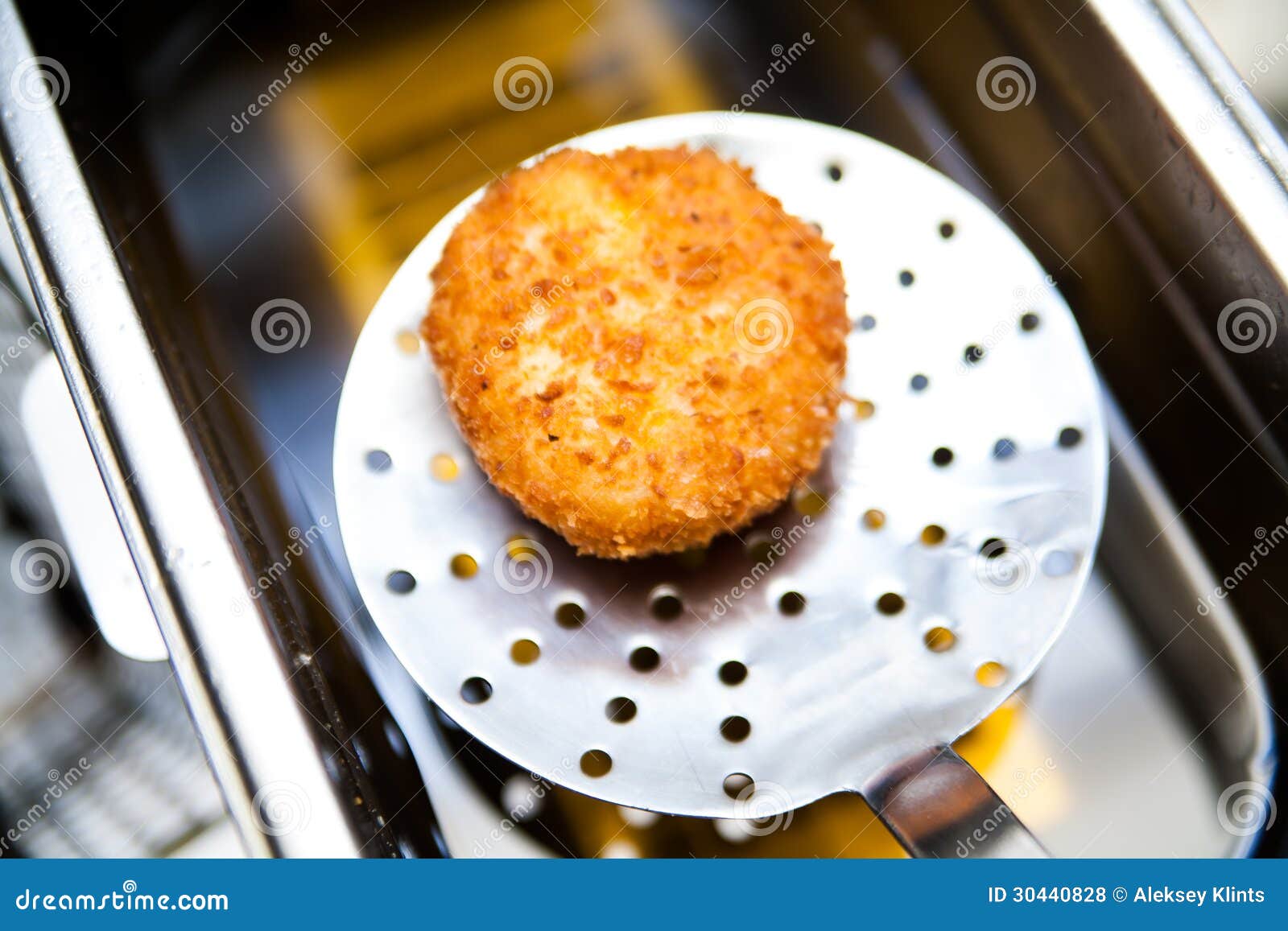 Kiev Chicken on Perforated Spoon Stock Photo - Image of fried ...