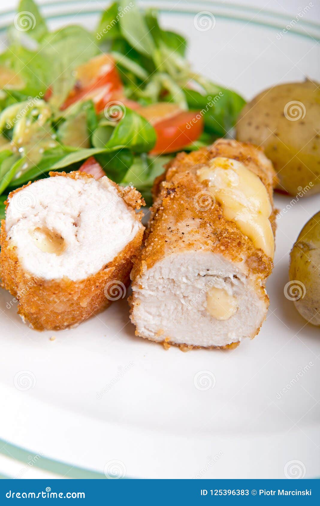 Kiev Cutlet with Jacket Potatoes and Salad Stock Image - Image of ... Kiev Cutlet with Jacket Potatoes and Salad Stock Image - Image of ...