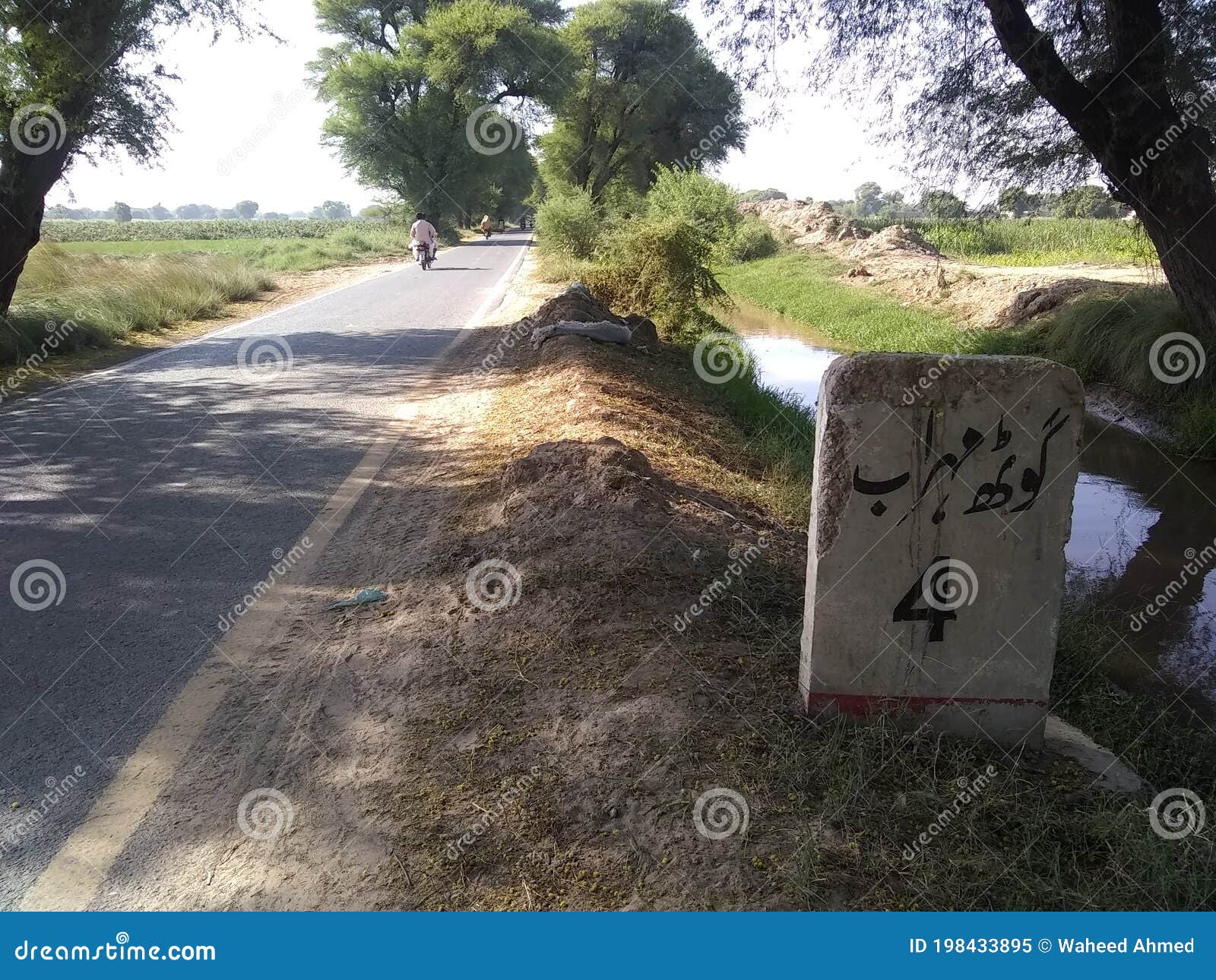 A Roadside Sign Indicating Kilometers Stock Image - Image of light ...