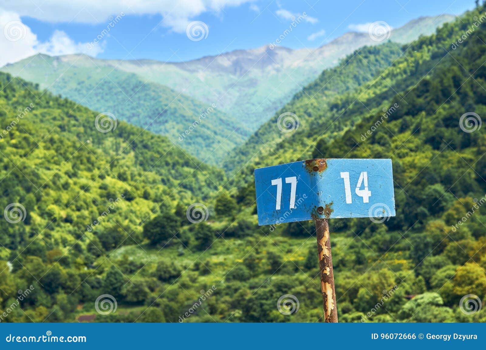 Kilometer Marker with Beautiful Mountains on the Background Stock Photo ...