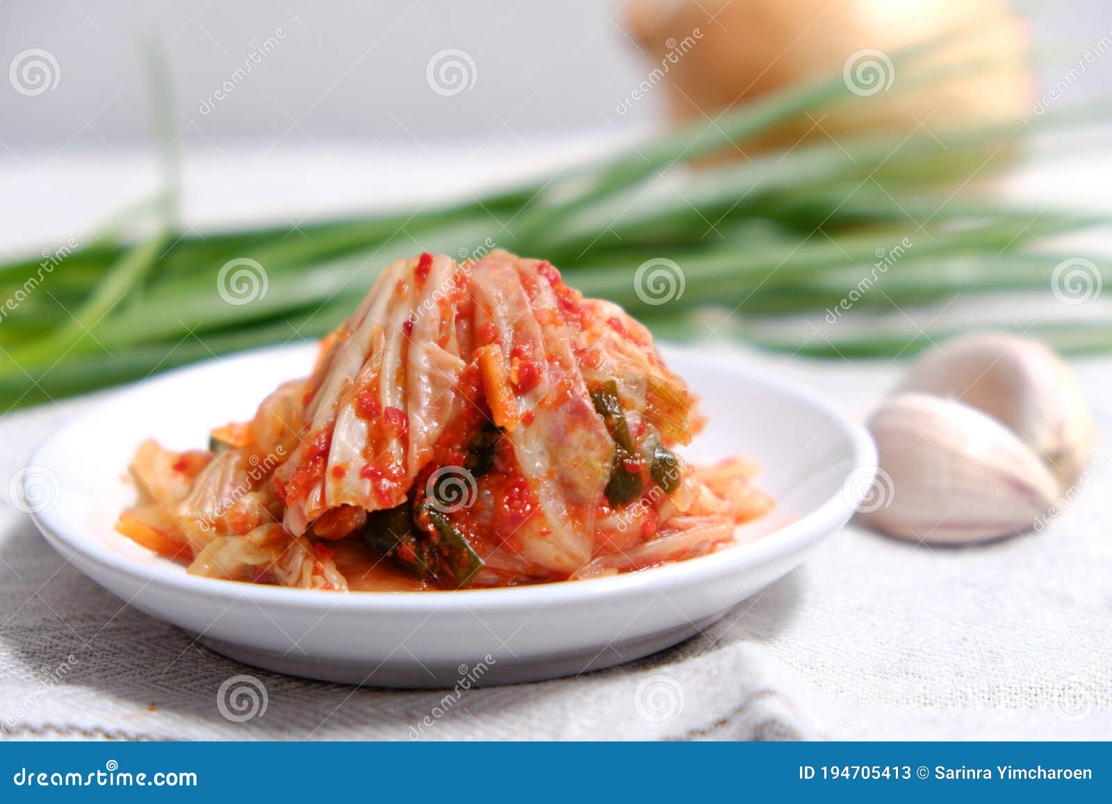 Kimchi is Placed in a White Plate with a Fork on Its Side Stock Image ...
