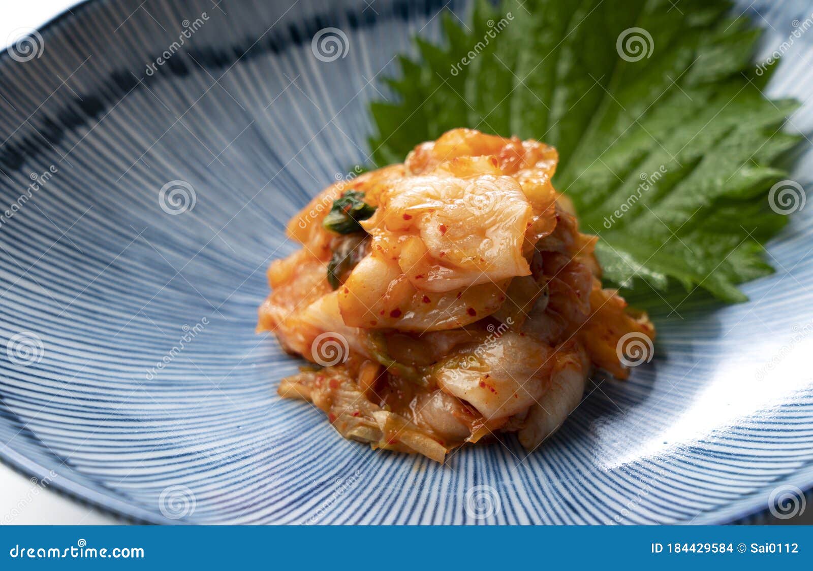 Kimchi on a Plate Against a White Background Stock Photo - Image of ...