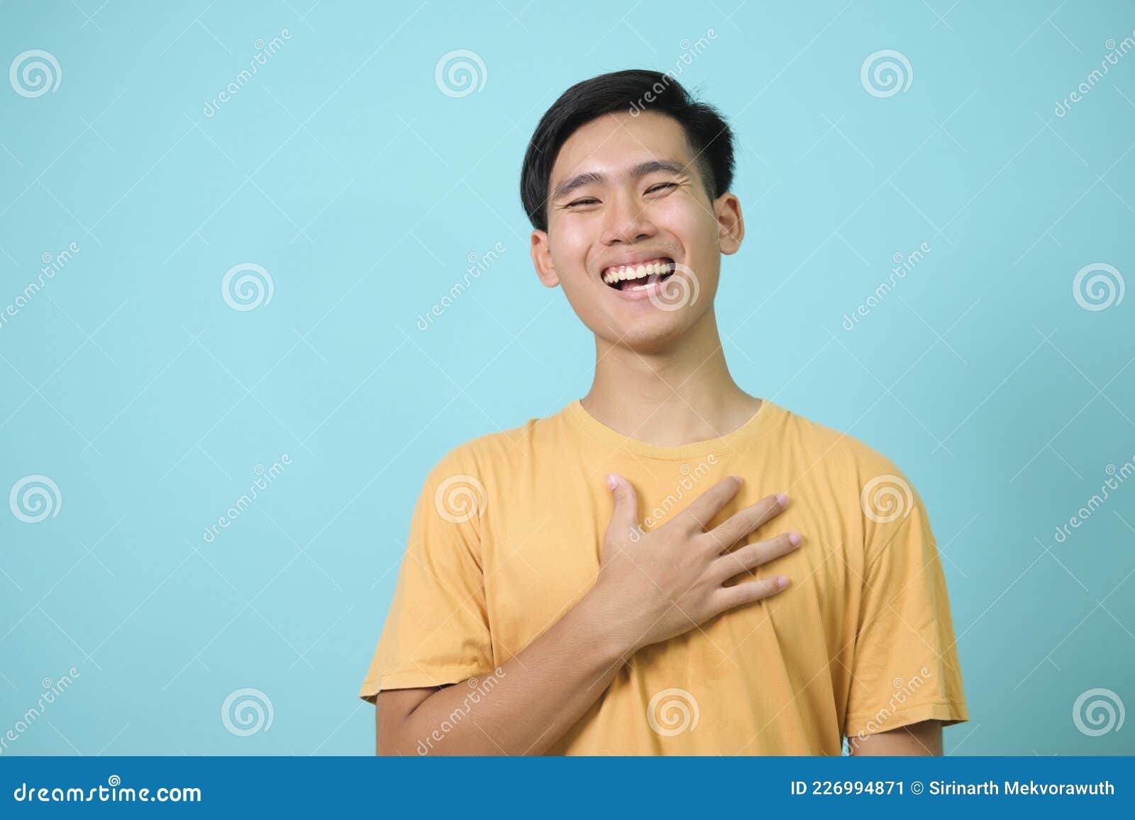 Kind Hearted Friendly Looking Young Man Keep Palms on Chest Stock Image ...