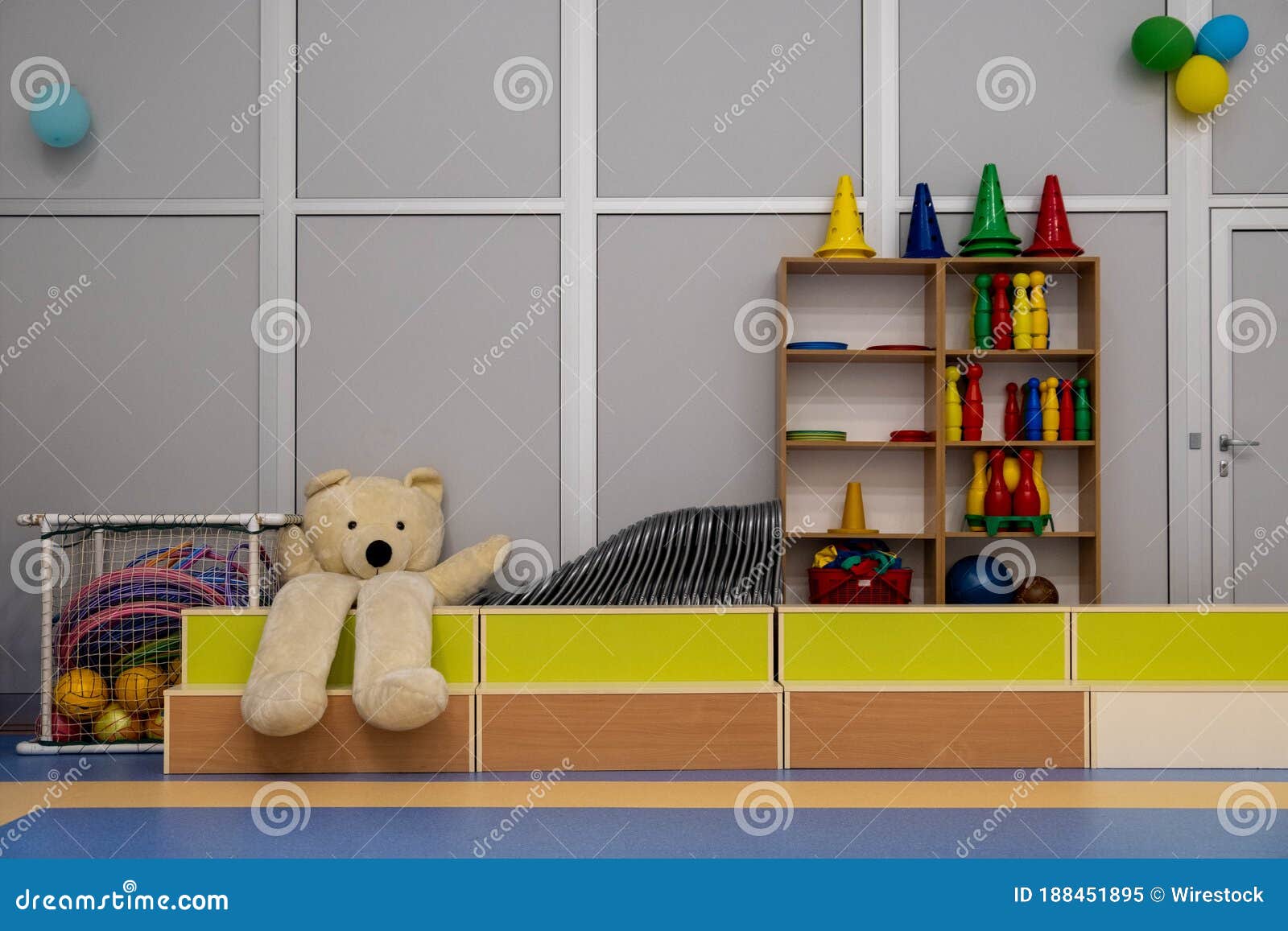 Kindergarten Area with Activity Objects Such As Bowling Ring Toss and ...