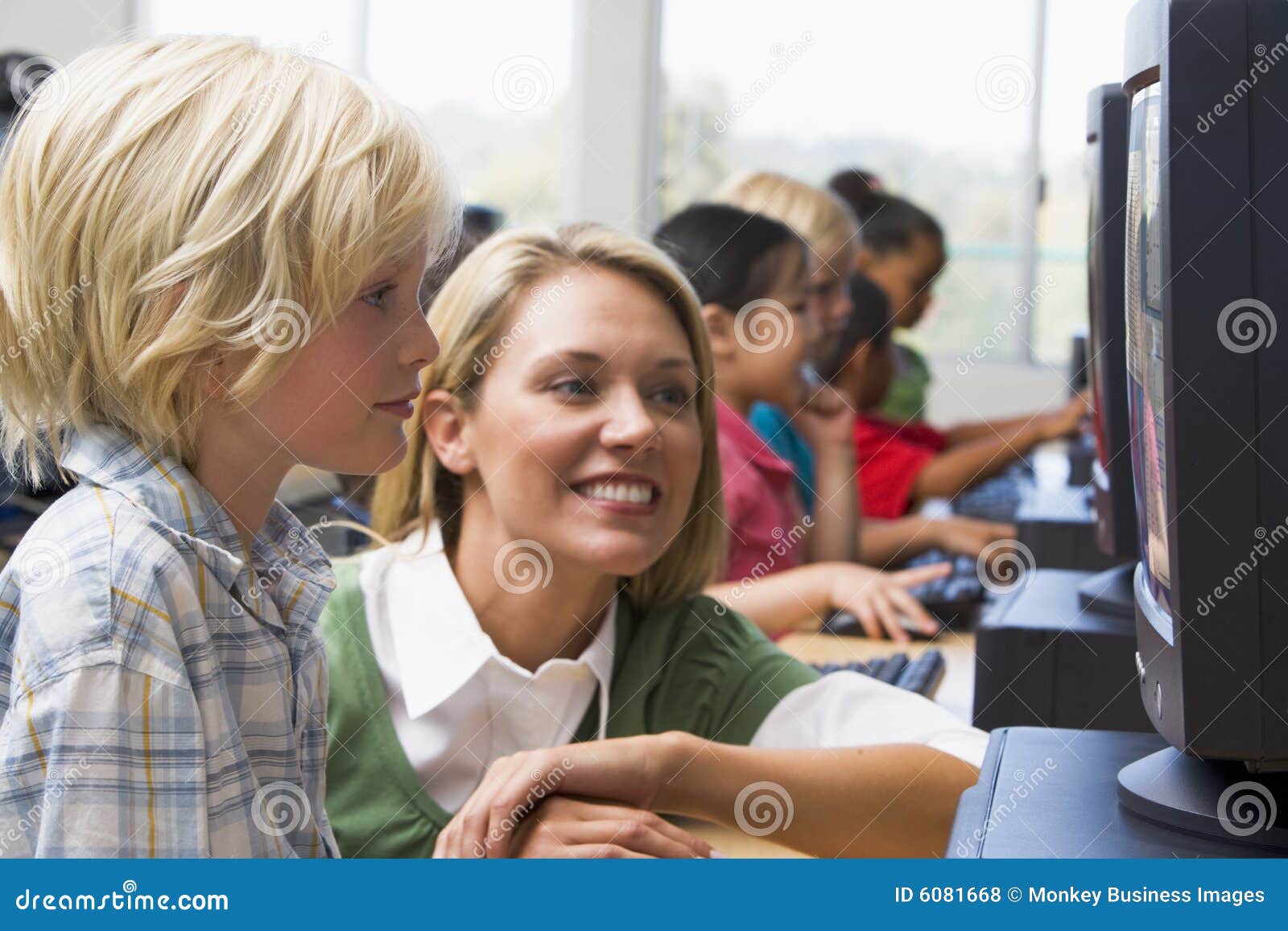Kindergarten Children Learn How To Use Computers Stock Photo - Image of ...