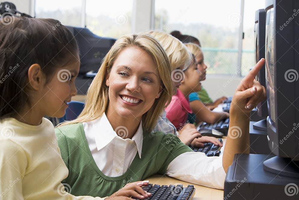 Kindergarten Children Learn How To Use Computers Stock Photo - Image of ...