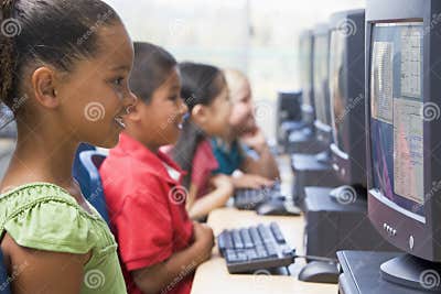 Kindergarten Children Learning To Use Computers Stock Image - Image of ...