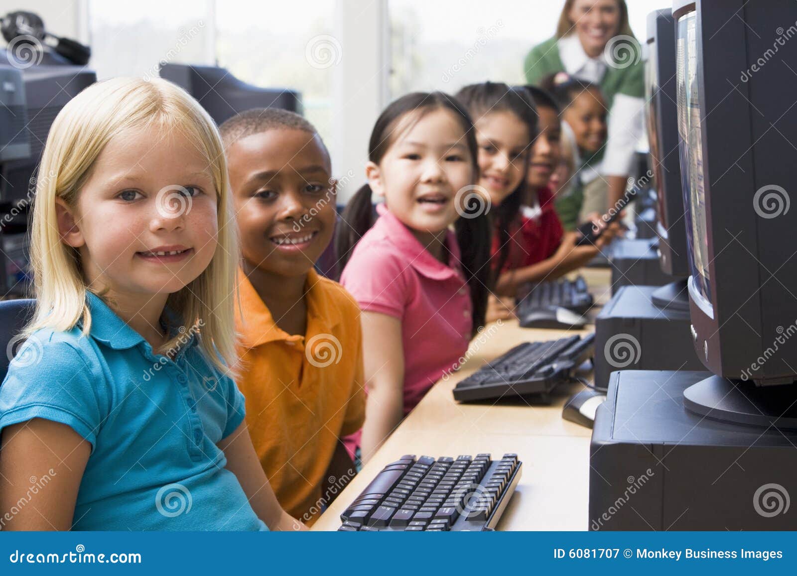 Kindergarten Children Learning To Use Computers Stock Image - Image of ...