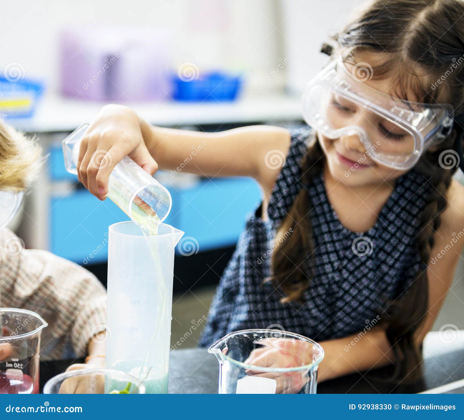 Kindergarten Students Mixing Solution In Science Experiment Laboratory ... Kindergarten Students Mixing Solution In Science Experiment Laboratory ...