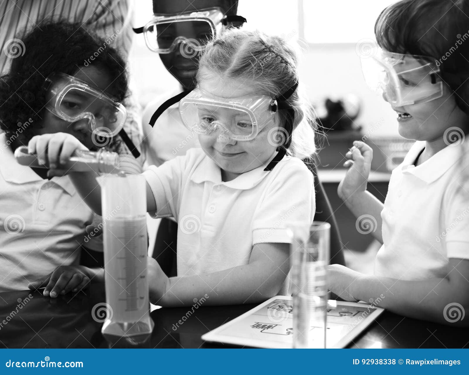 Kindergarten Students Mixing Solution in Science Experiment Laboratory ...