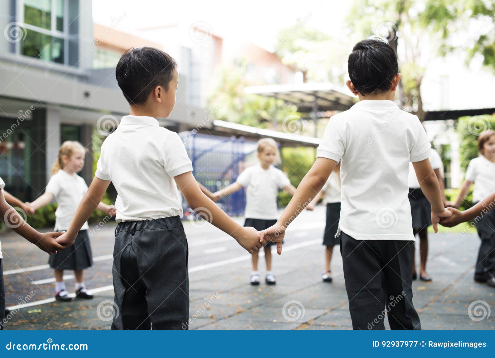 Kindergarten Students Standing Holding Hands To Stock Image - Image of ...