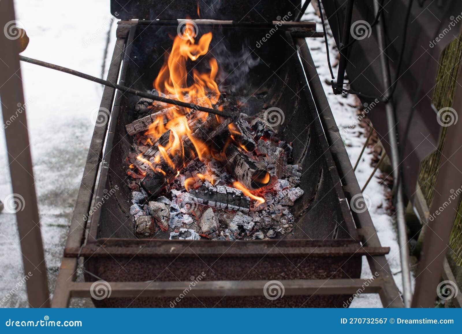 Kindling a Fire in the Brazier, Burning Coals Stock Image - Image of ...