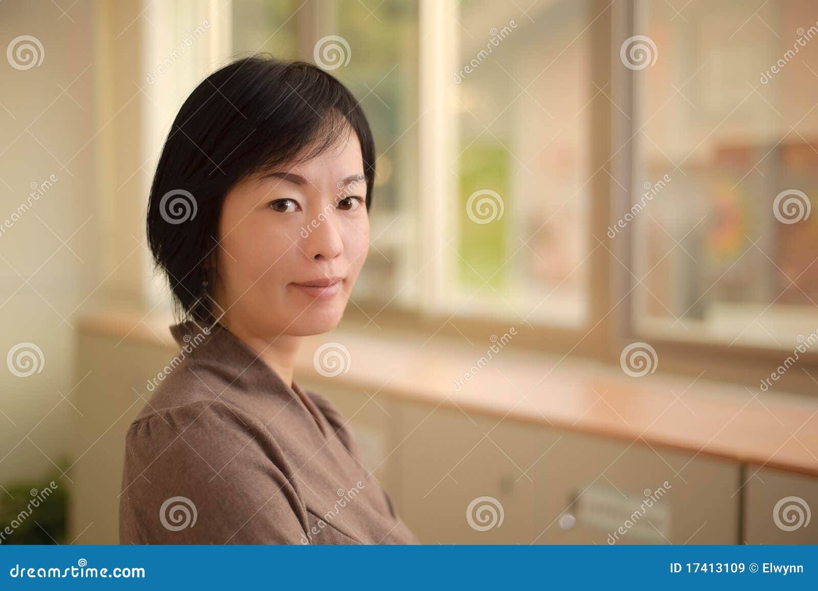 Kindly Asian woman stock image. Image of businesswoman - 17413109