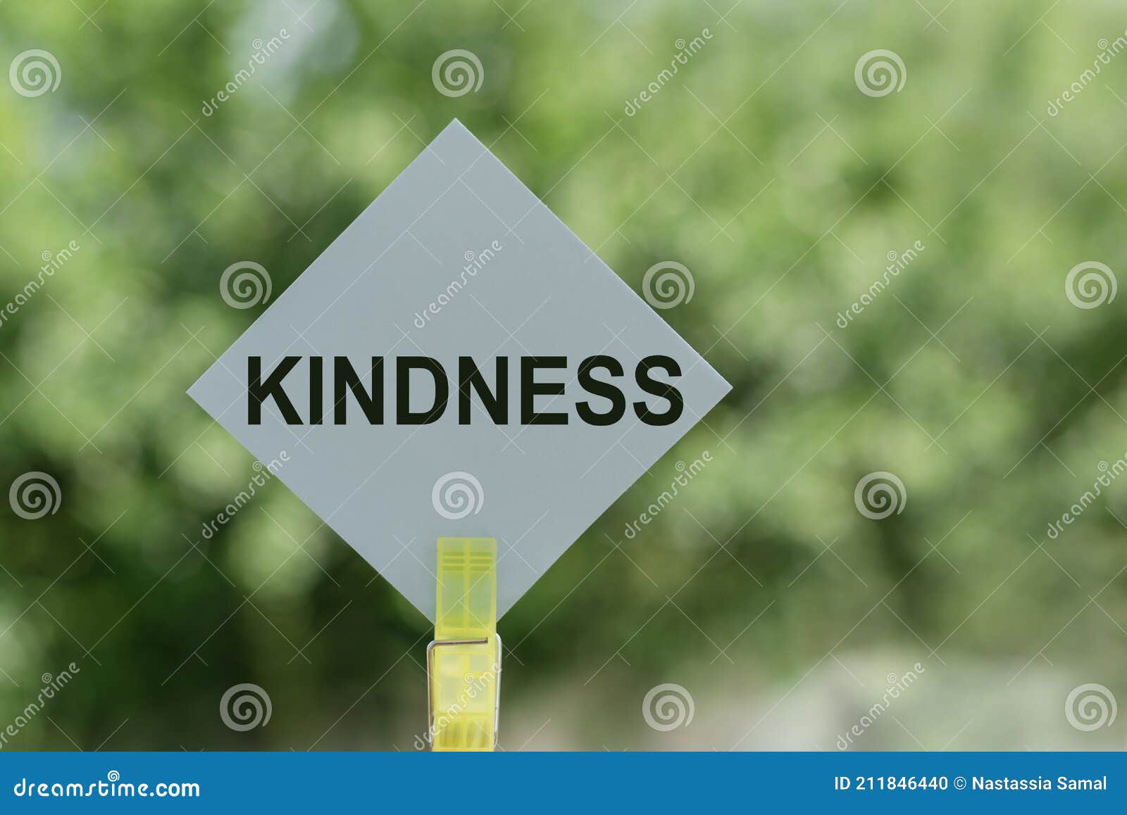 Kindness Text on Paper with Clothespins with Bokeh on Background. the ...