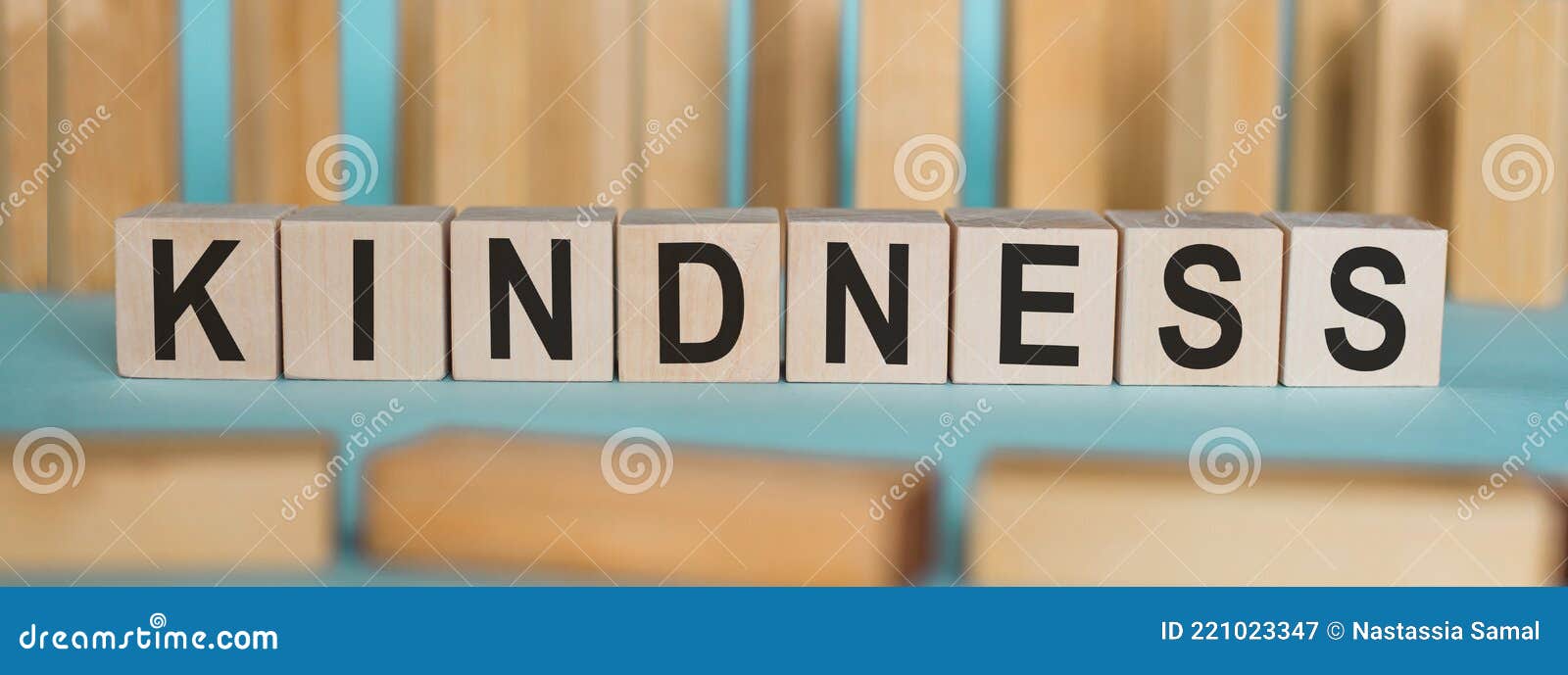 KINDNESS - Word Written on Wooden Blocks on Light Blue Background Stock ...