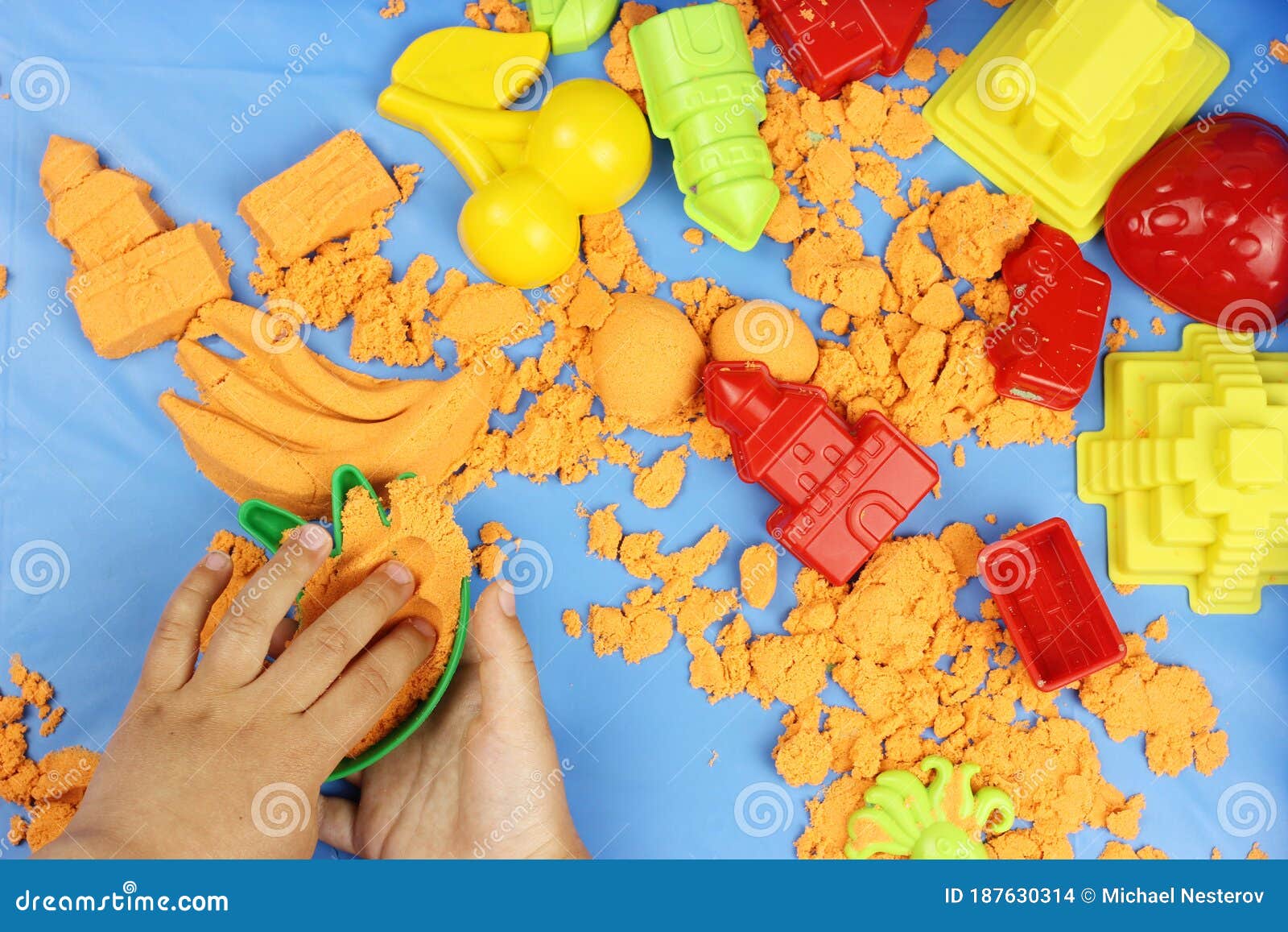 Kinetic Sand. Child Building Sandcastle Various Figures Stock Photo ...