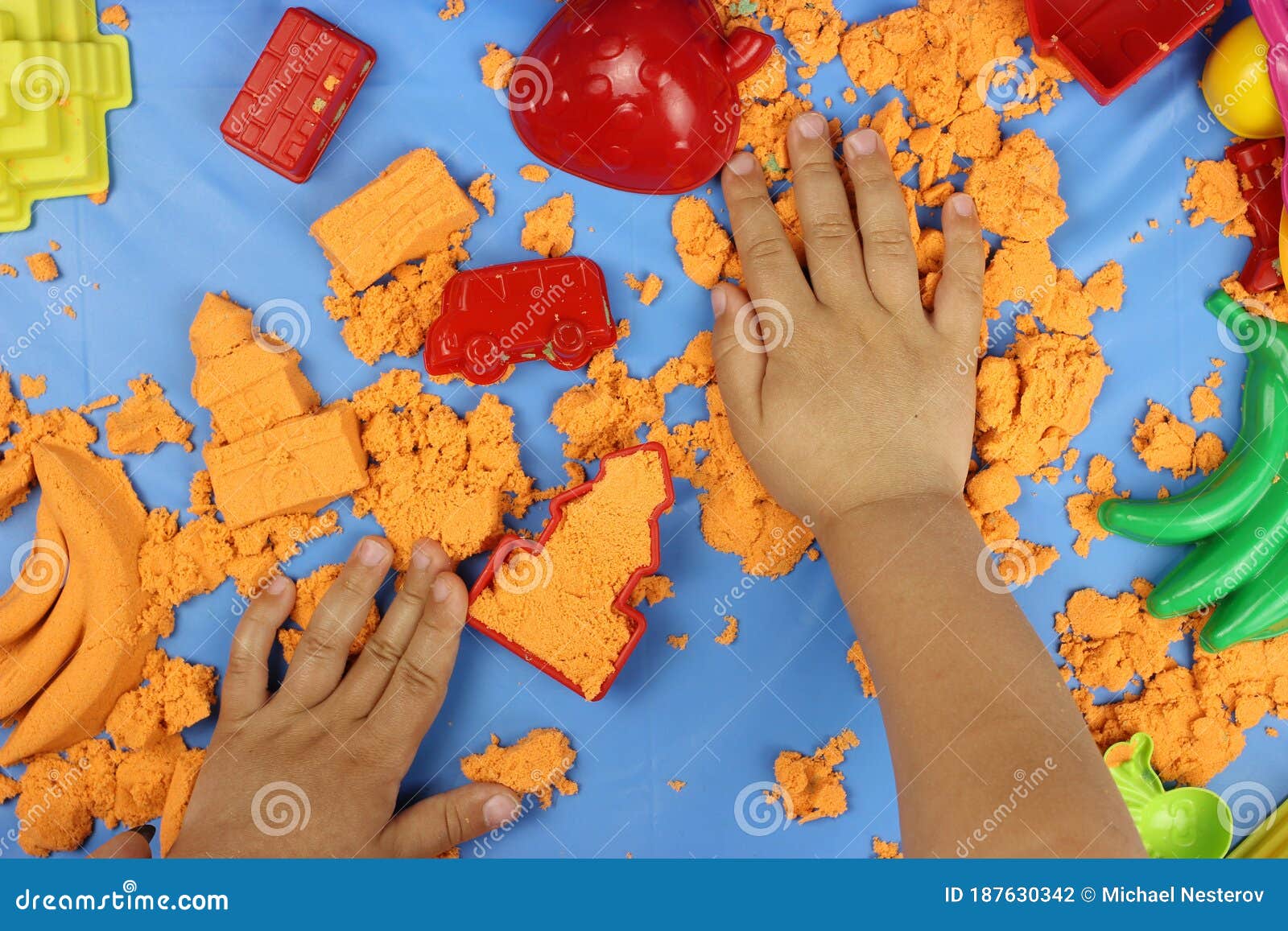Kinetic Sand. Child Building Sandcastle Various Figures Stock Photo ...