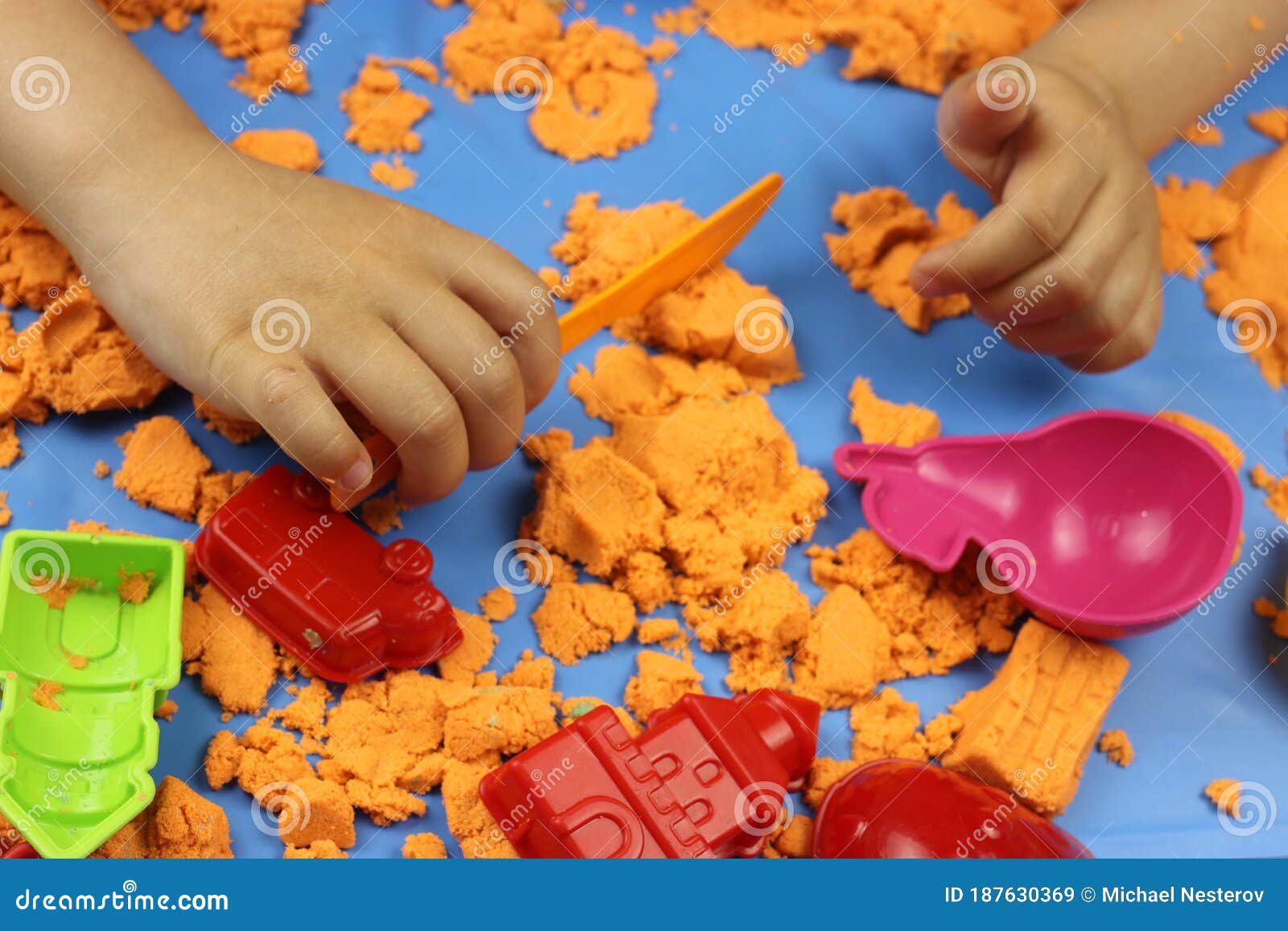 Kinetic Sand. Child Building Sandcastle Various Figures Stock Image ...