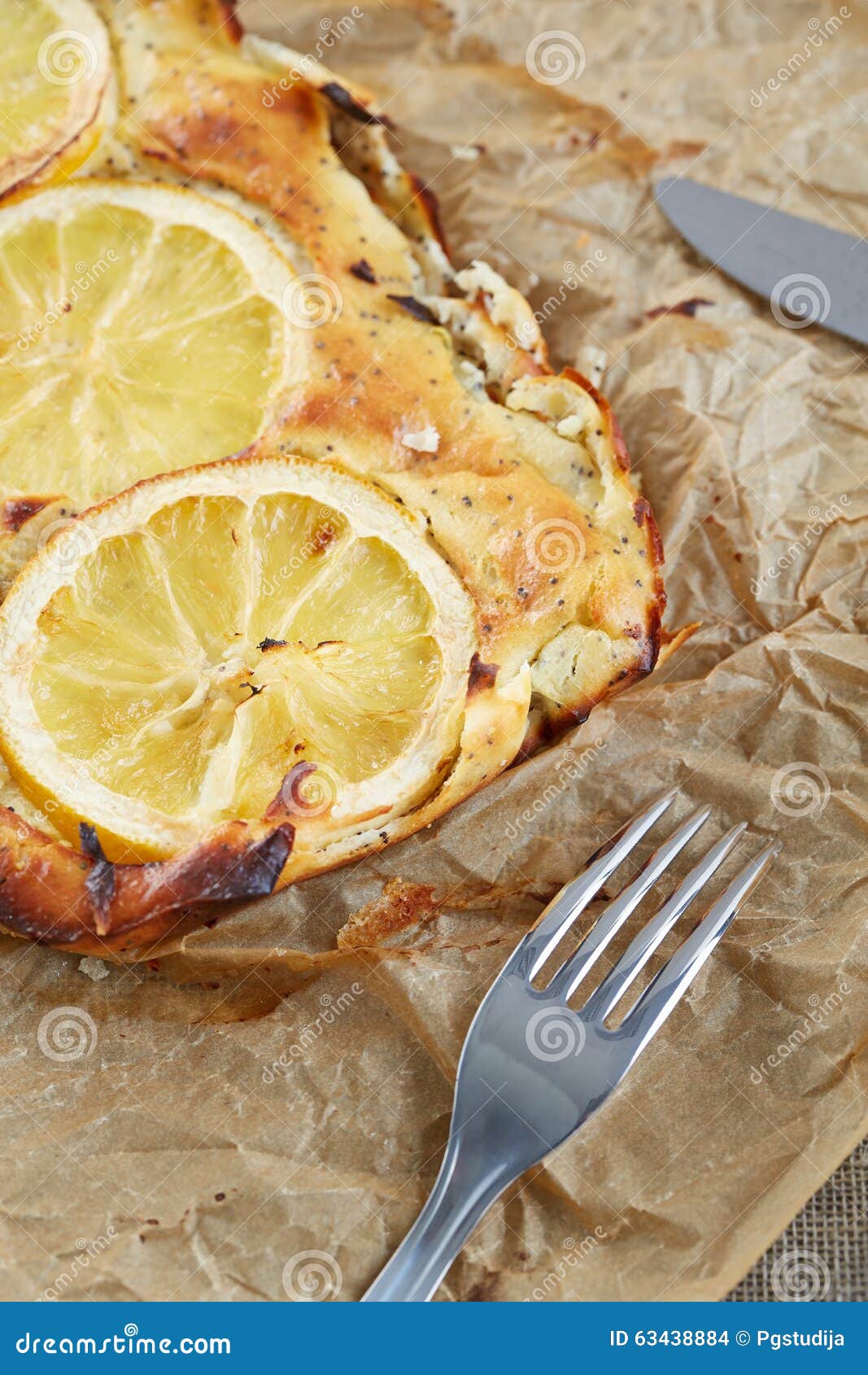 Kisch with Fish and Slices of Lemons Stock Photo - Image of crust, food ...