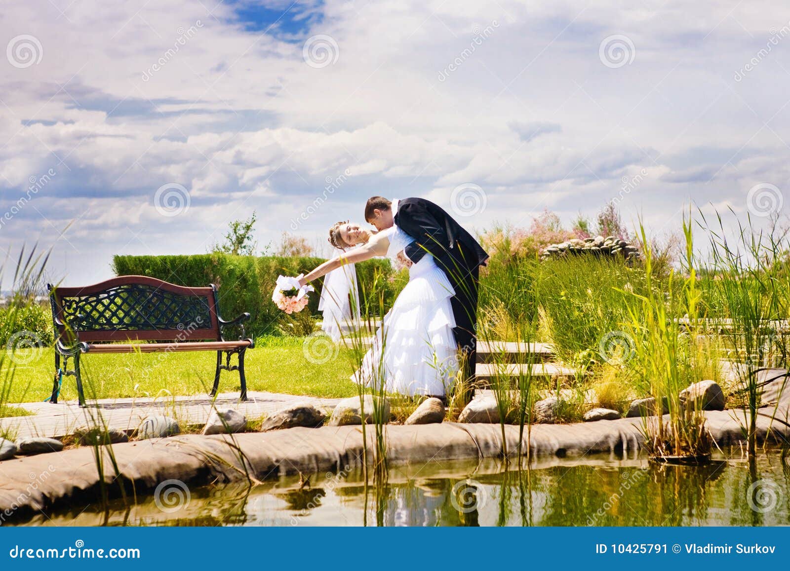 Kiss of bride and groom stock image. Image of beauty - 10425791