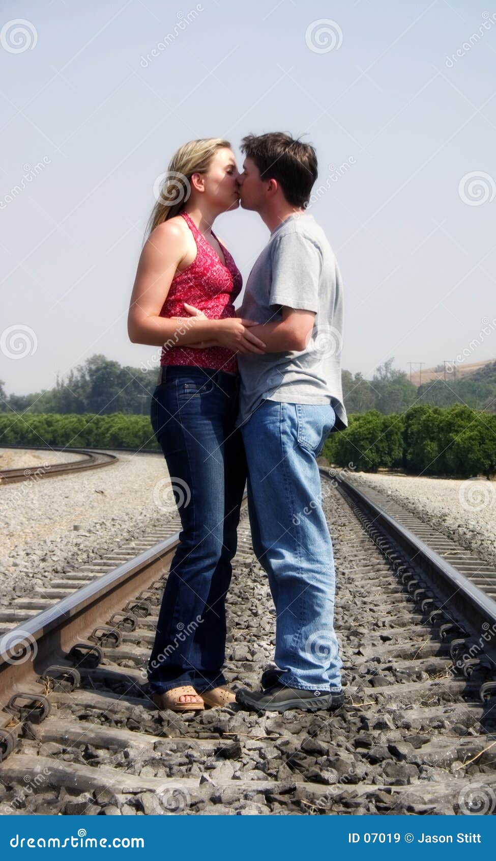 Kissing Couple stock image. Image of teens, kissing, tracks - 7019
