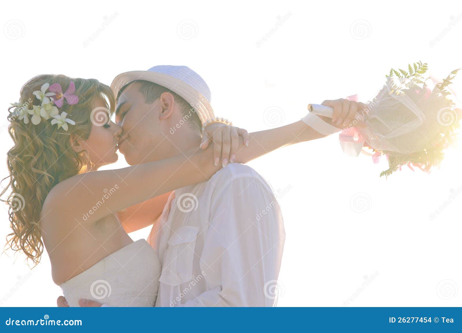 Kissing couple stock photo. Image of bouquet, girl, celebration - 26277454