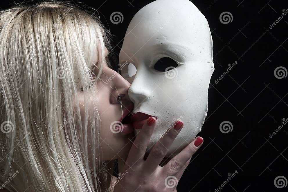 Kissing the mask stock photo. Image of female, disquise - 605516