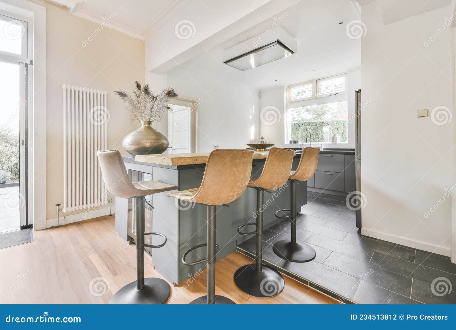 Kitchen with bar table stock photo. Image of inside - 234513812