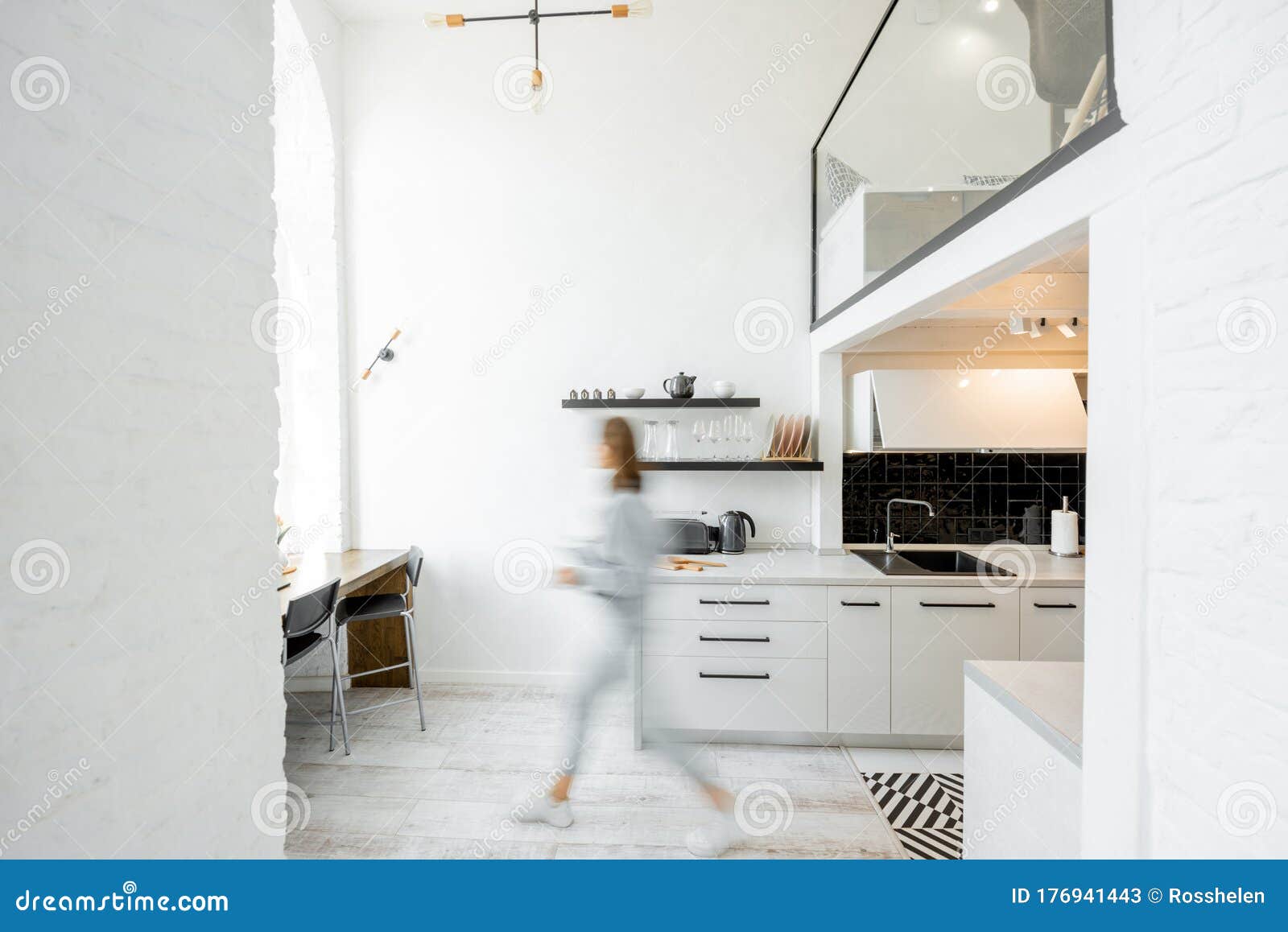 Kitchen with Blurred Human Figure Stock Image - Image of person, inside ...