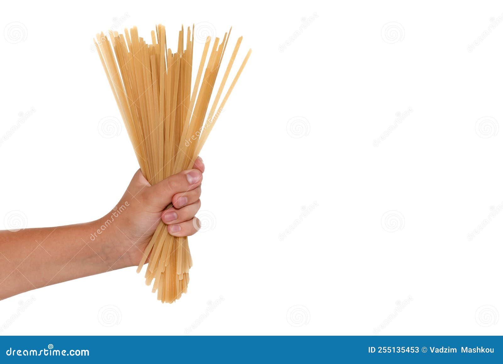 The Kitchen and the Cooking Theme: Man`s Hand Holding a Stack of Raw ...