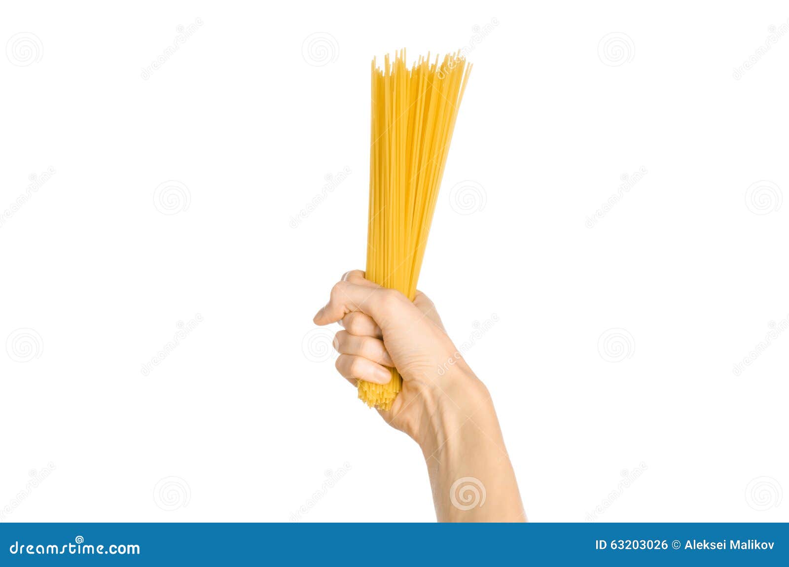 The Kitchen and the Cooking Theme: Man S Hand Holding a Stack of Raw ...