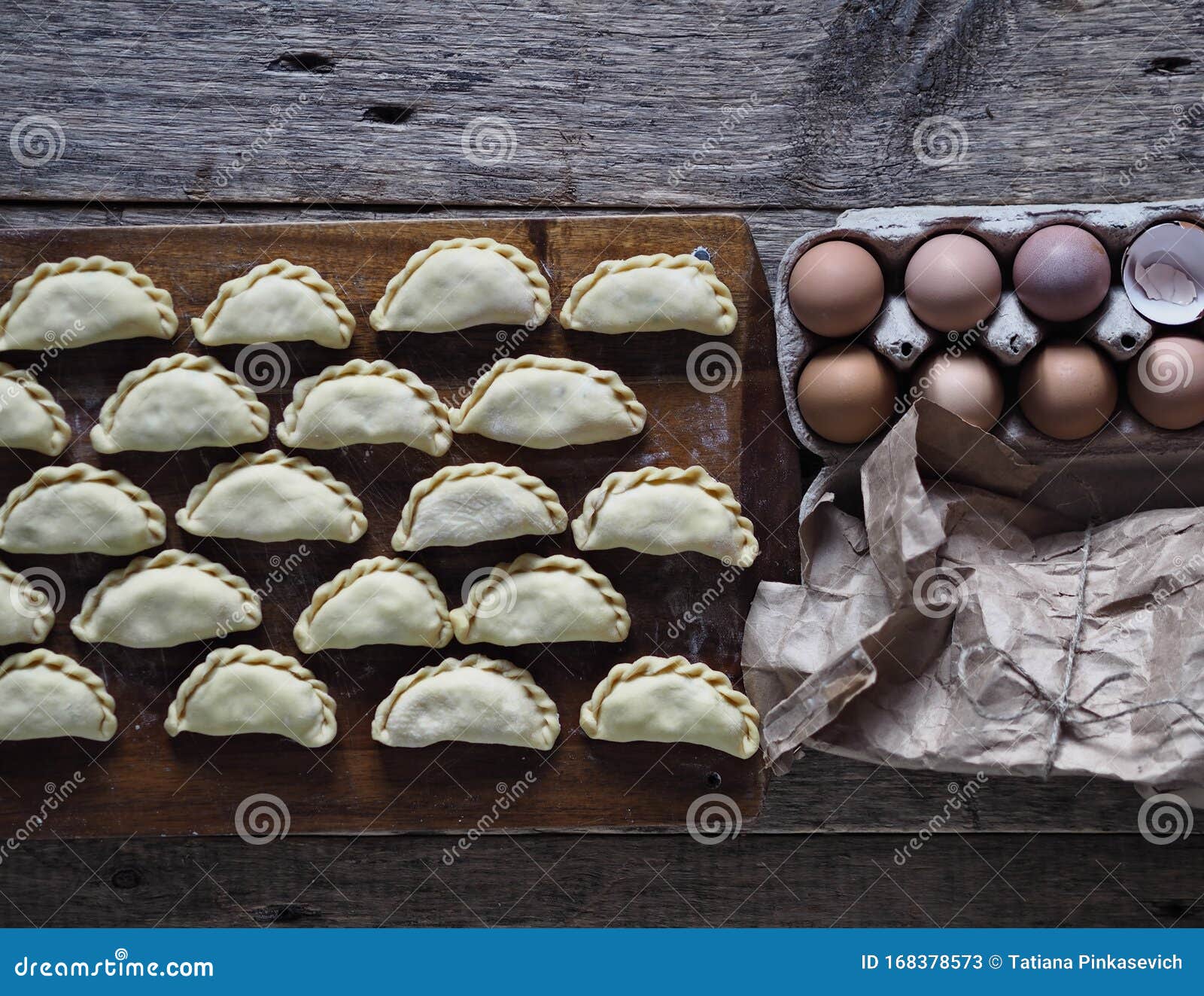 On the Kitchen Cutting Board, Ready-made Dumplings with Ingredients for ...