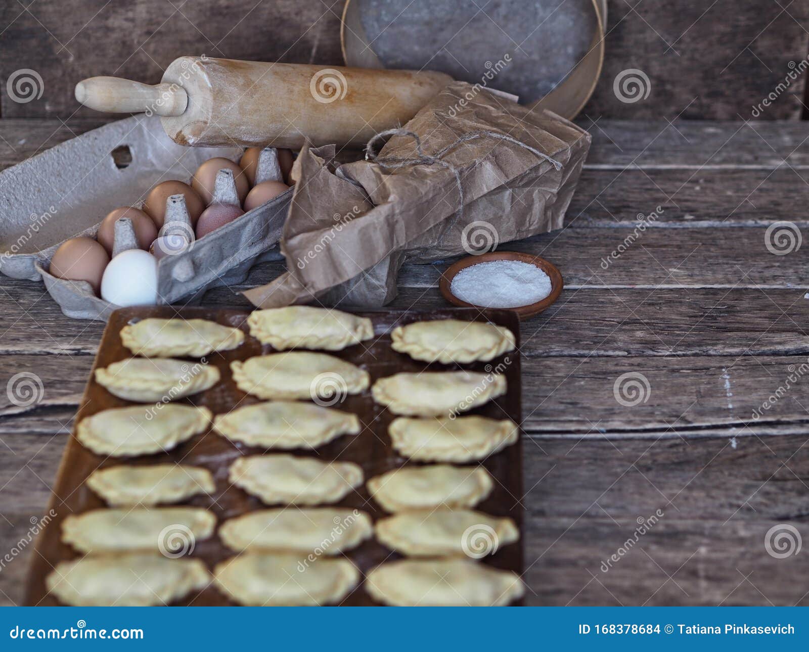 On the Kitchen Cutting Board, Ready-made Dumplings with Ingredients for ...