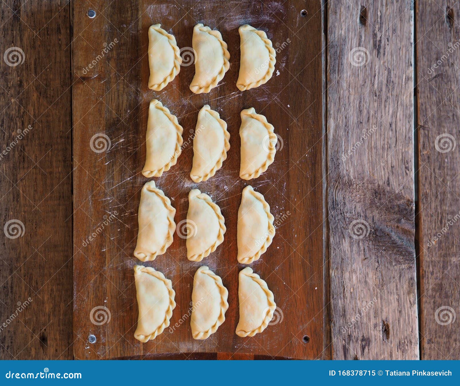 On the Kitchen Cutting Board, Ready-made Dumplings with Ingredients for ...
