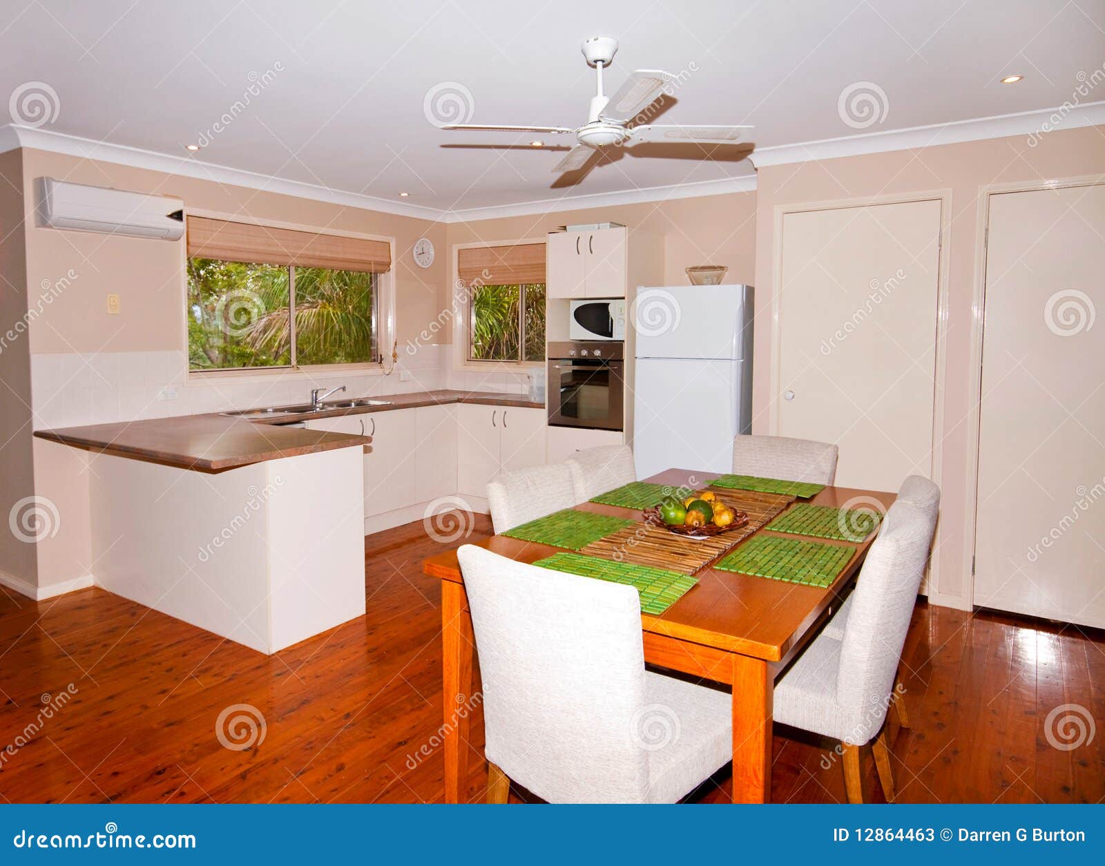 Kitchen and Dining Rooms stock image. Image of cook, residence - 12864463