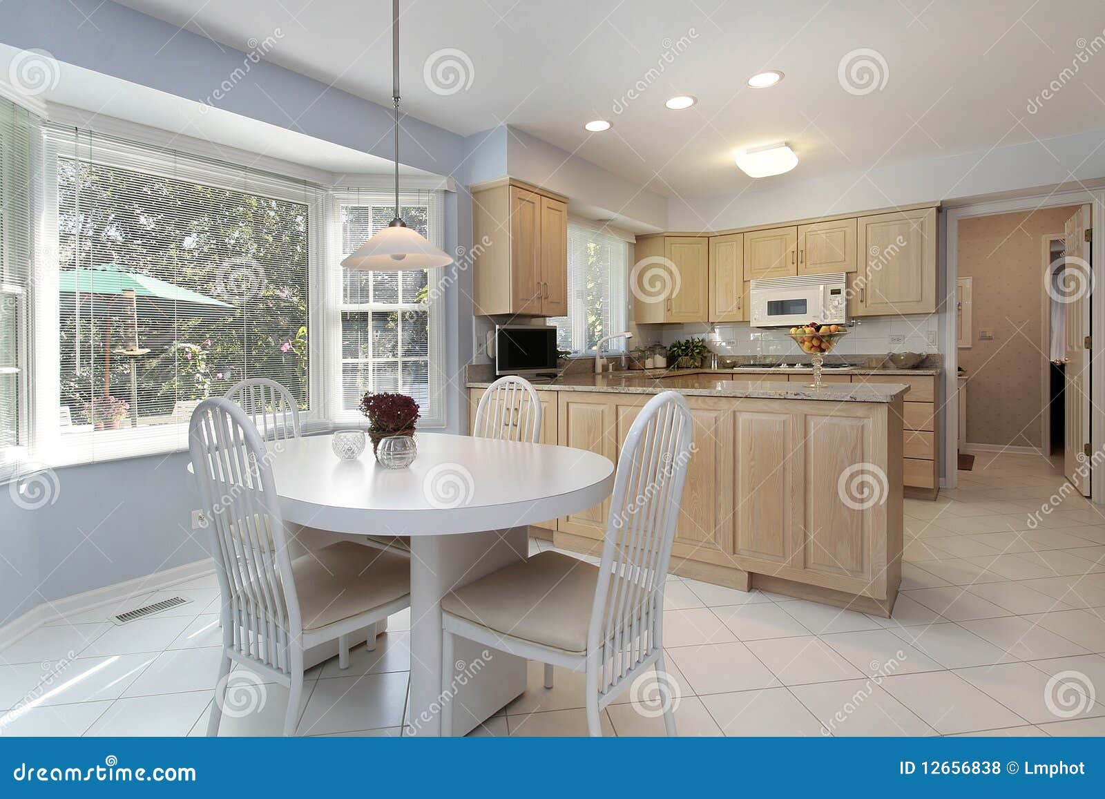 Kitchen with eating area stock photo. Image of architecture - 12656838