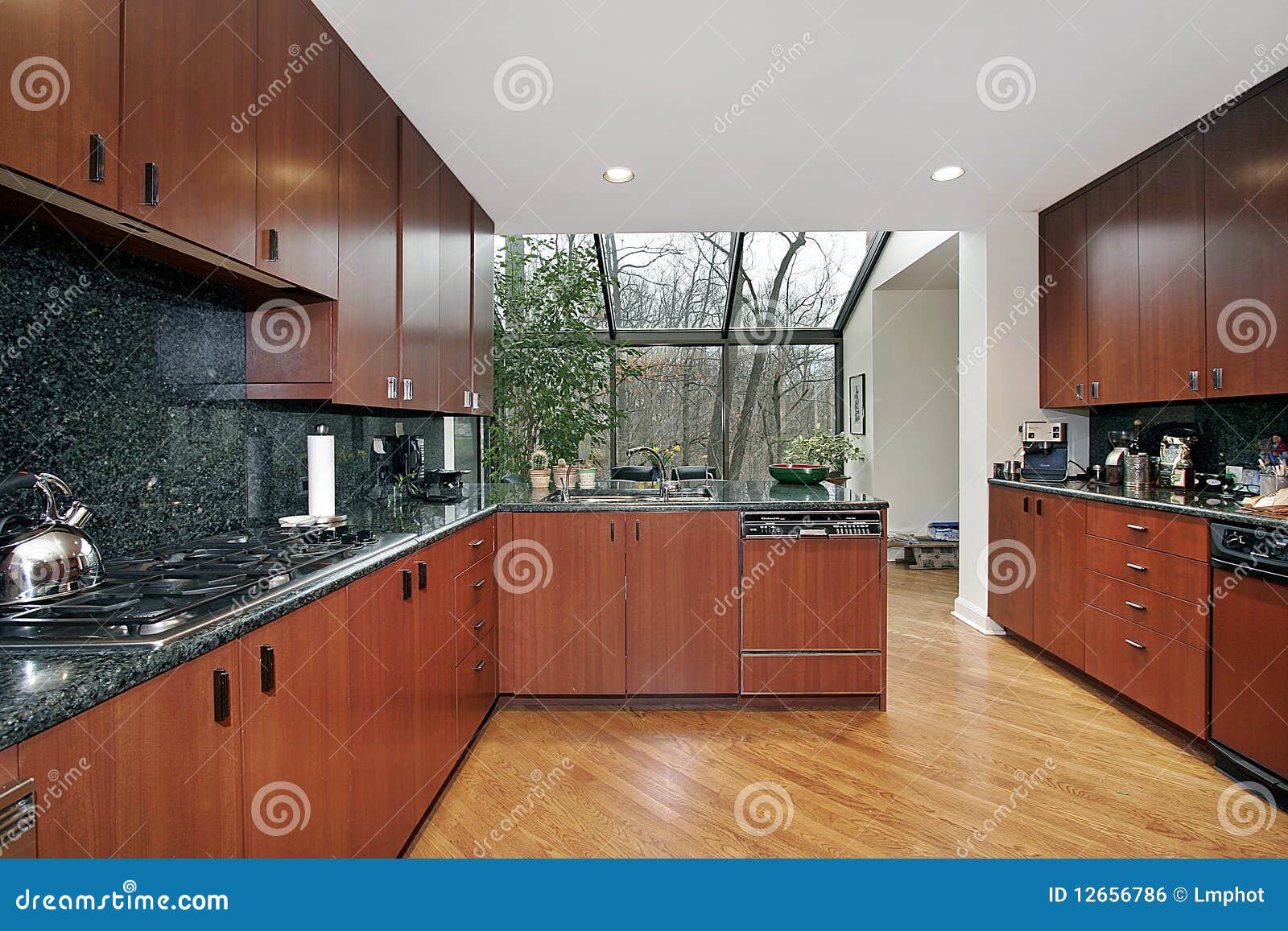 Kitchen with Glass Enclosed Eating Area Stock Photo - Image of supper ...