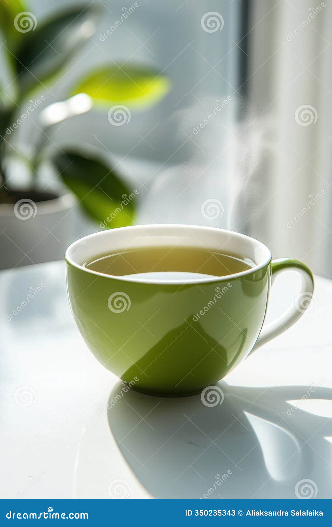 Kitchen Interior Design, Green Tea Steaming on a White Table in a ...