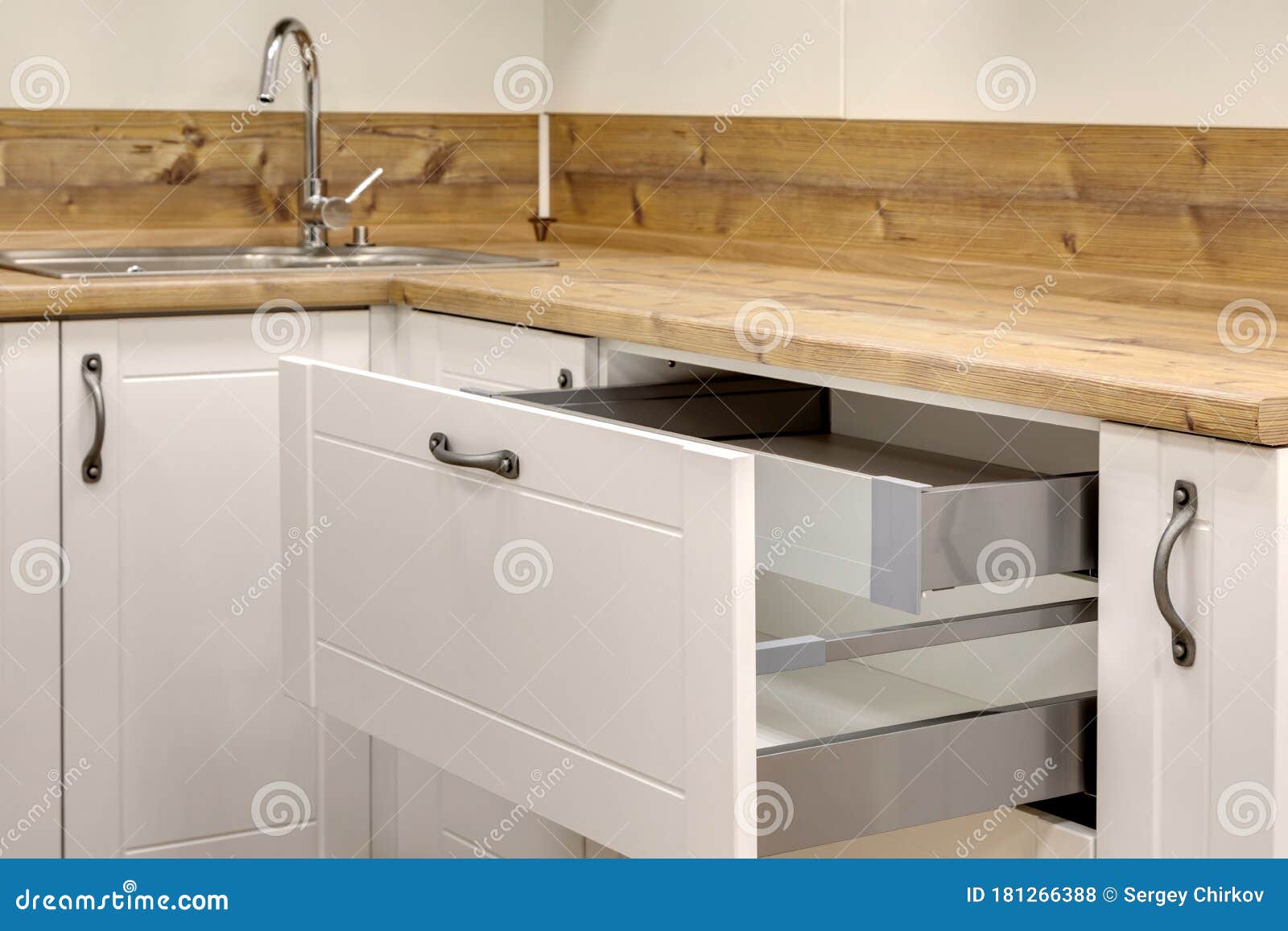 A Kitchen Interior with Drawers Stock Photo - Image of contemporary ...
