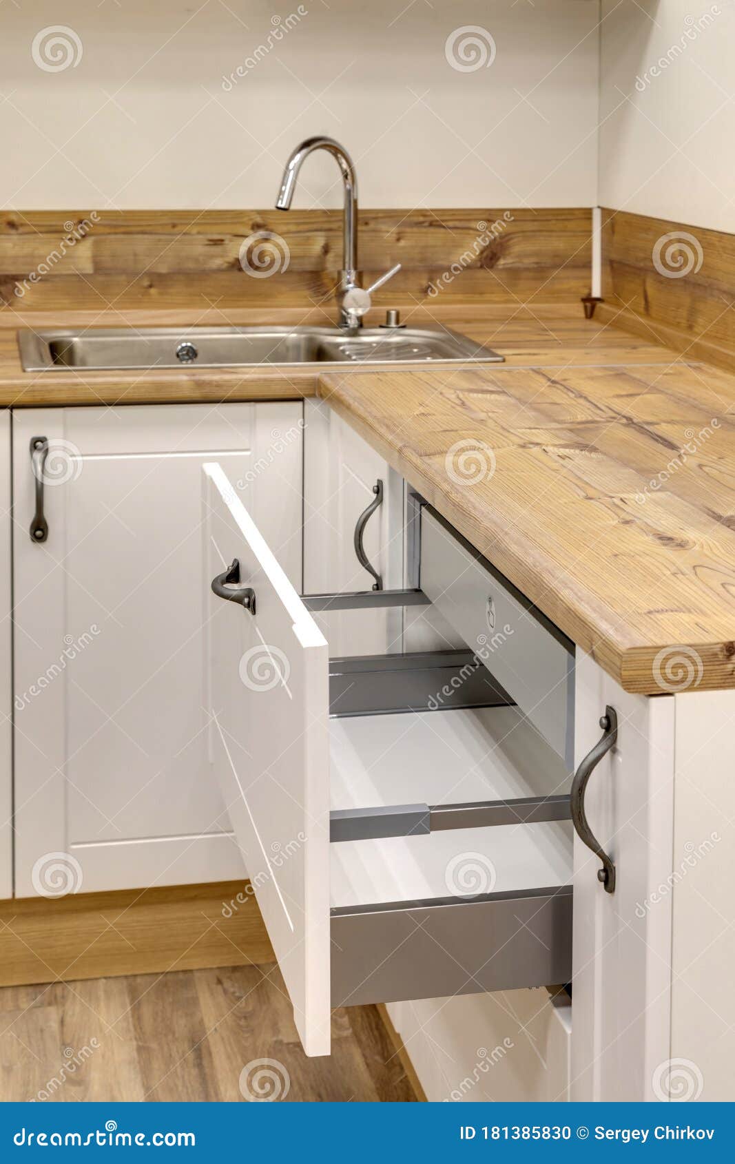 A Kitchen Interior with Drawers Stock Photo - Image of table ...