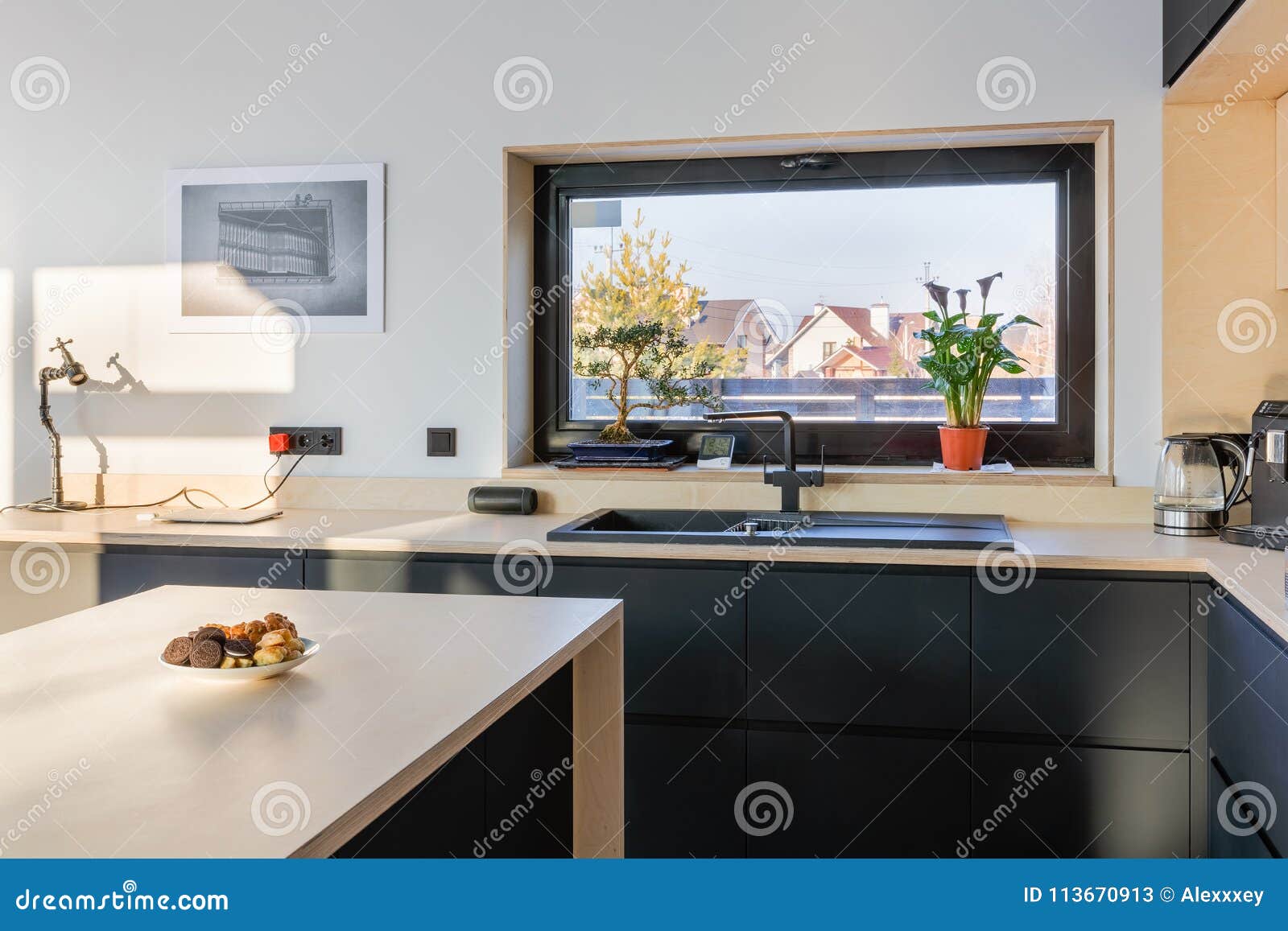 Kitchen Interior with a Large Window and a View of the Neighboring ...