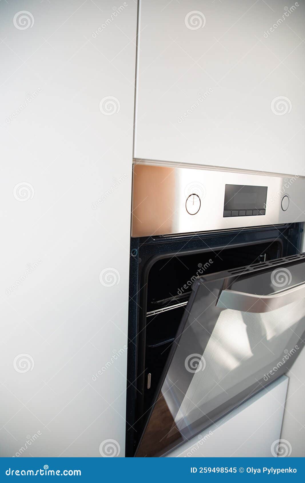 Kitchen Interior. a Modern Open Oven Built into a White Kitchen Stock ...