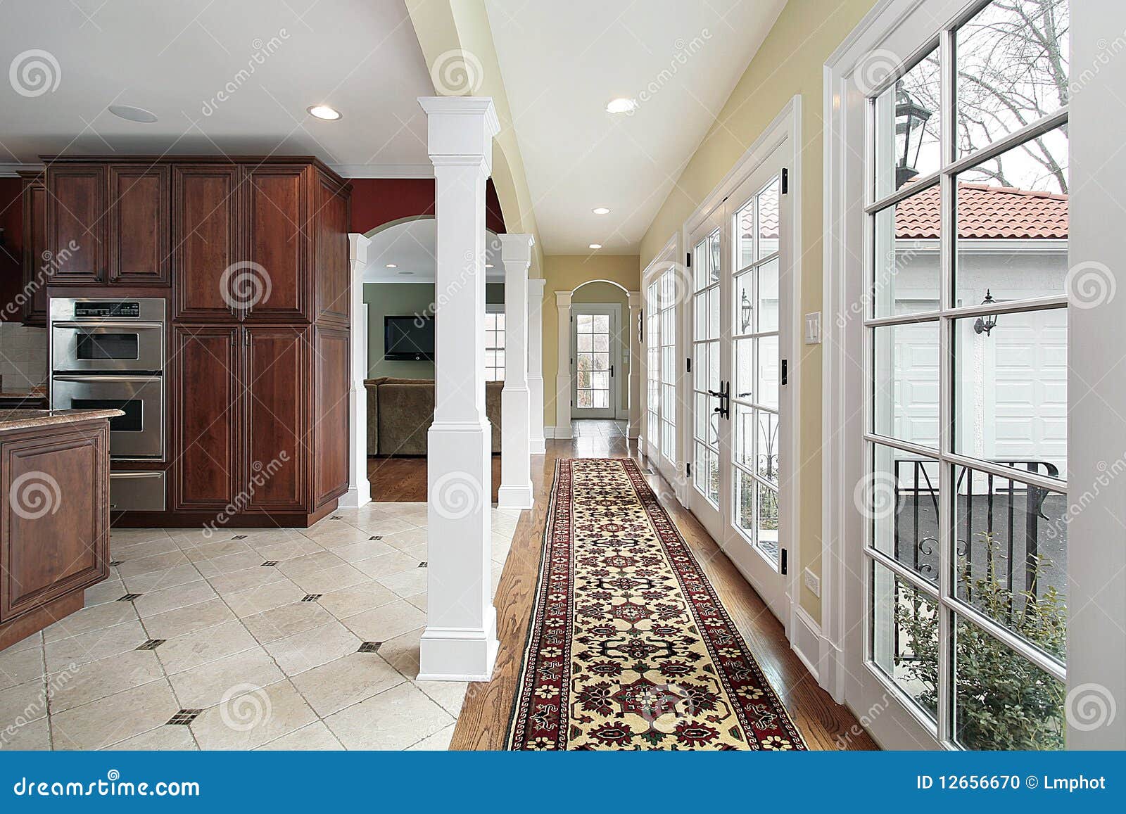 Kitchen with long hallway stock photo. Image of upscale - 12656670