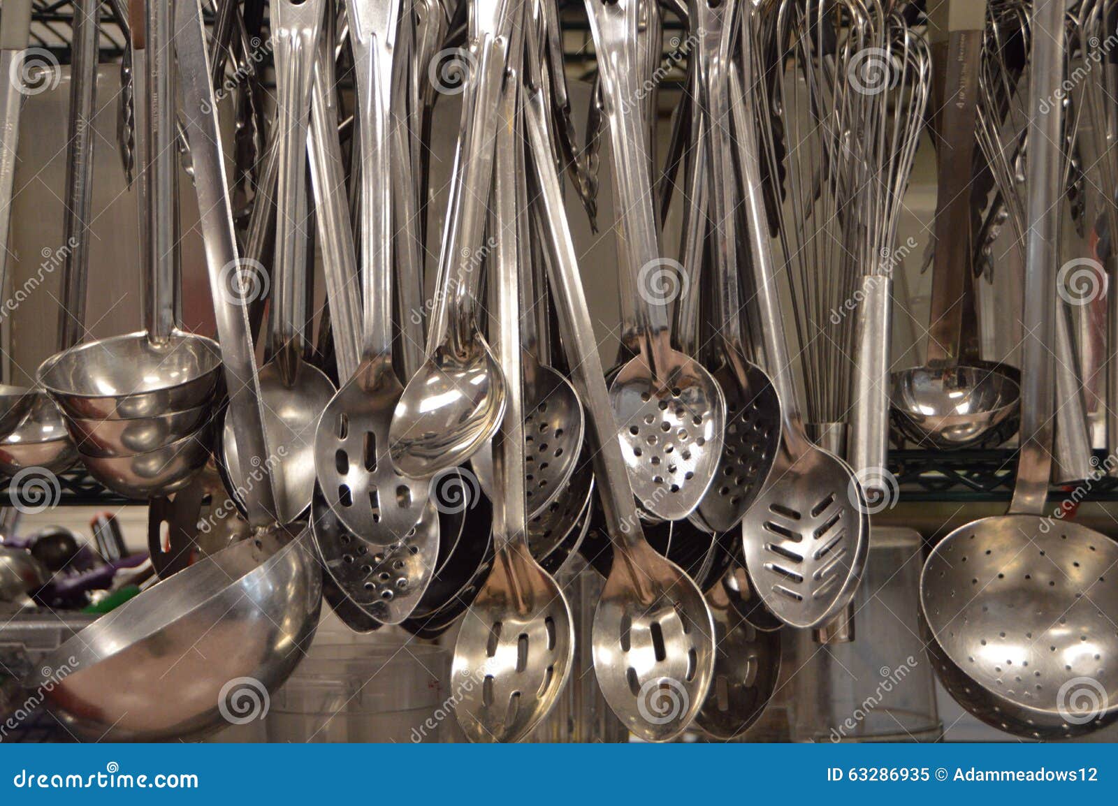 Rack of metal kitchenware stock image. Image of details - 63286935