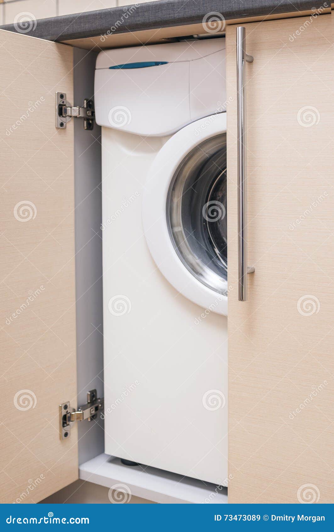 Kitchen Mini Cabinet with Portrable Washing Machine Inside Stock Image ...