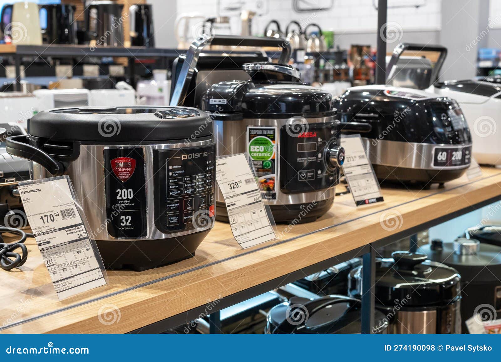 Kitchen Multi Cookers from Different Manufacturers on a Shelf in a ...