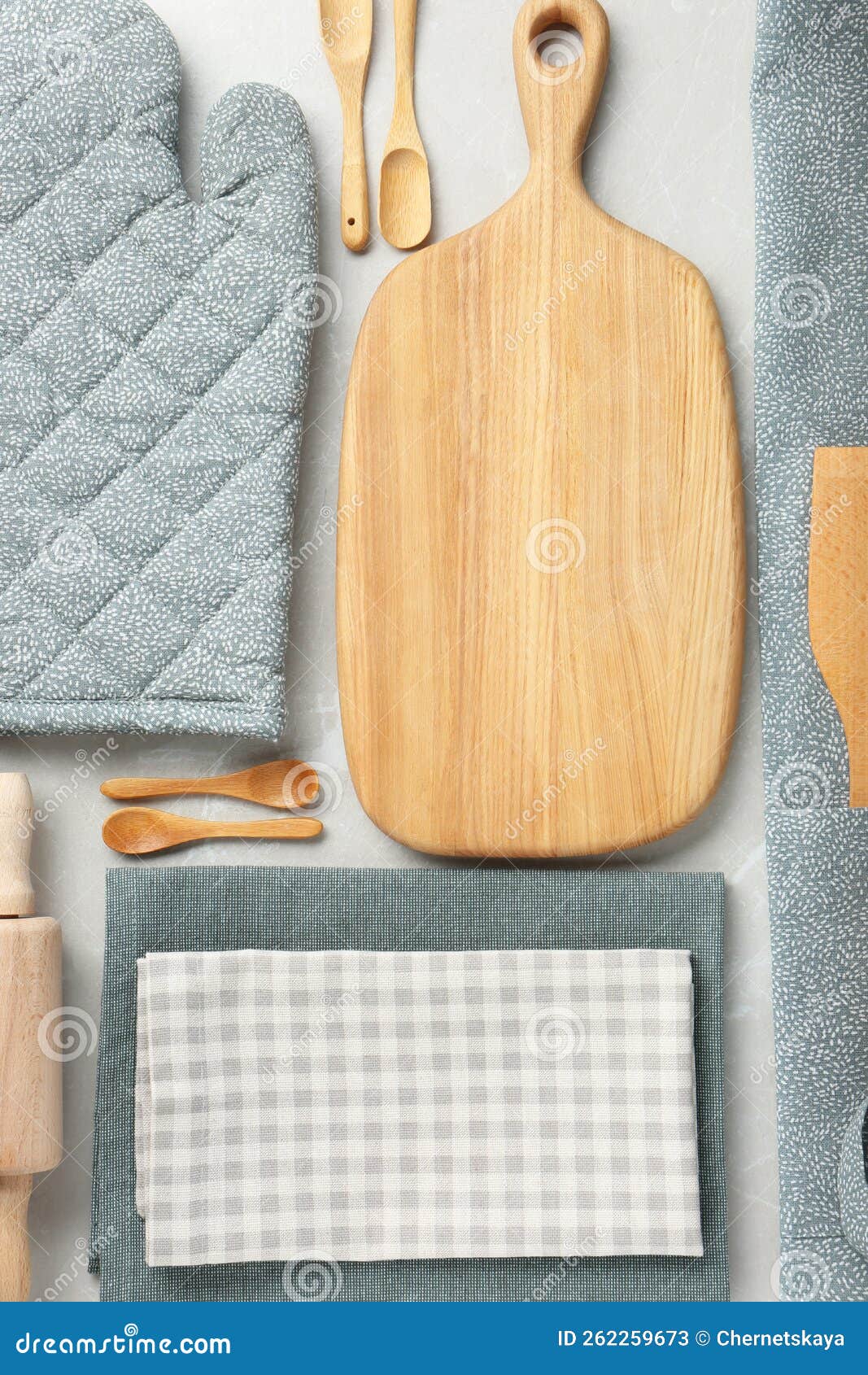Kitchen Napkins, Apron and Different Utensils on Light Grey Table, Flat ...